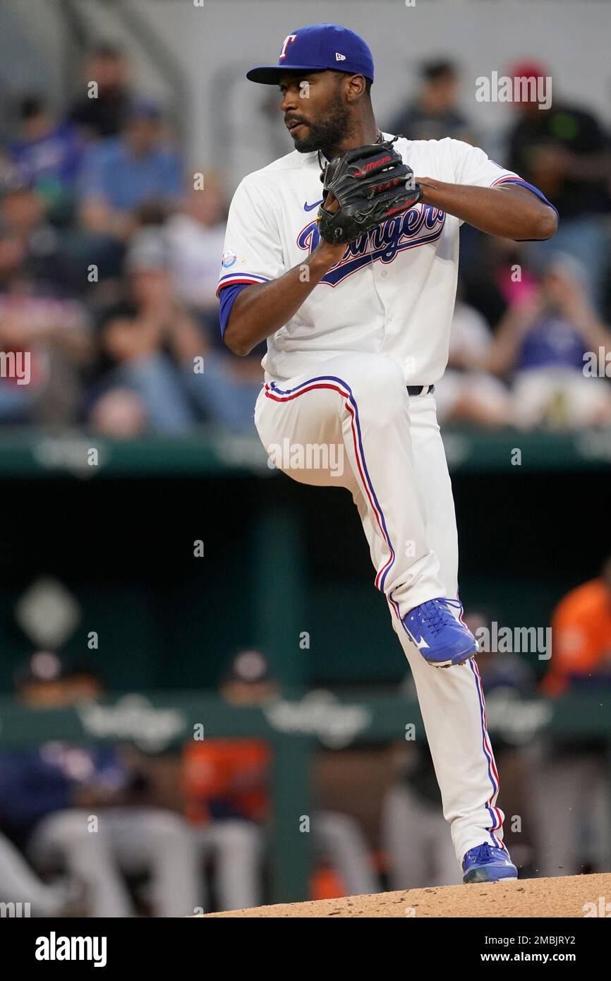 Texas Rangers' Taylor Hearn pitches in the third inning of a baseball ...