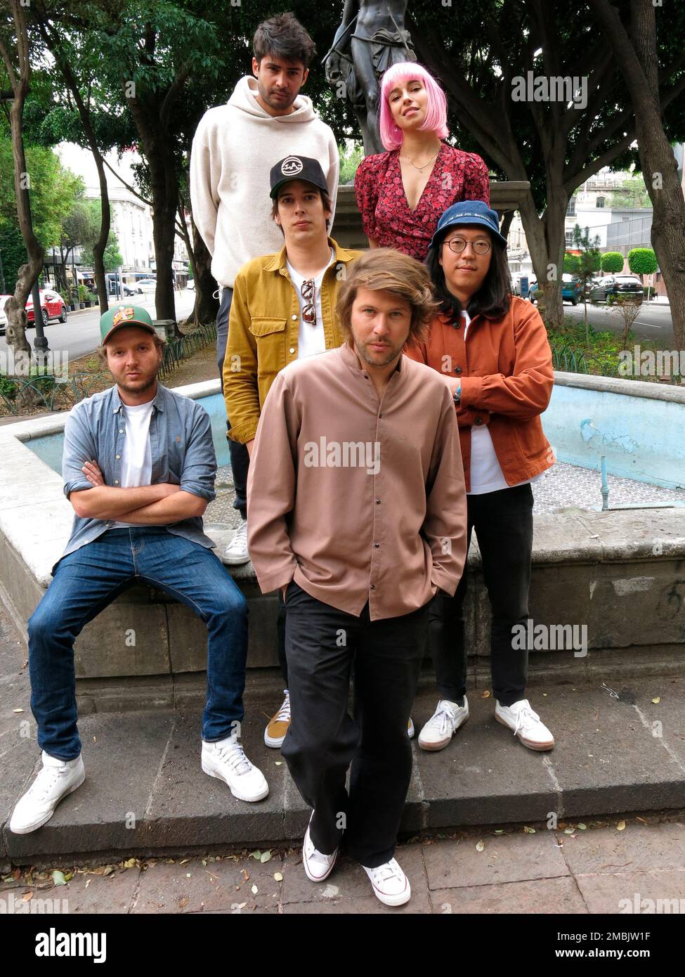 Members of the French band L'Impératrice: Achille Trocellier, clockwise ...