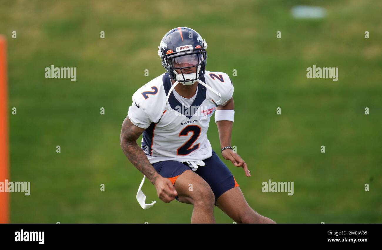 Denver Broncos cornerback Pat Surtain II takes part in drills during a ...
