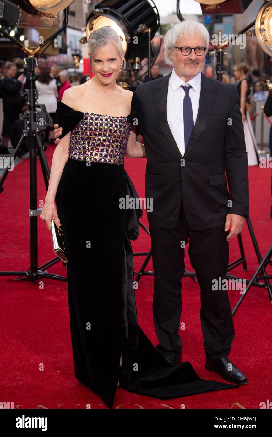 Elizabeth McGovern and Simon Curtis pose for photographers upon arrival ...