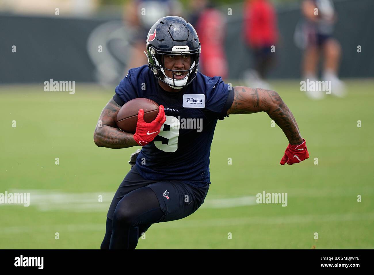 Houston Texans tight end Brevin Jordan runs with the ball after ...