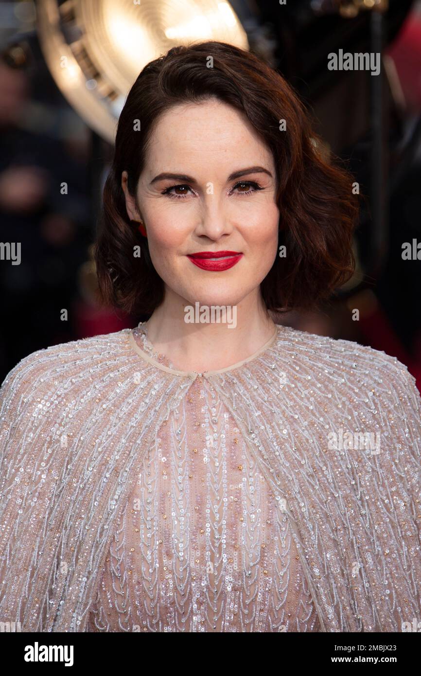 Michelle Dockery poses for photographers upon arrival at the World ...