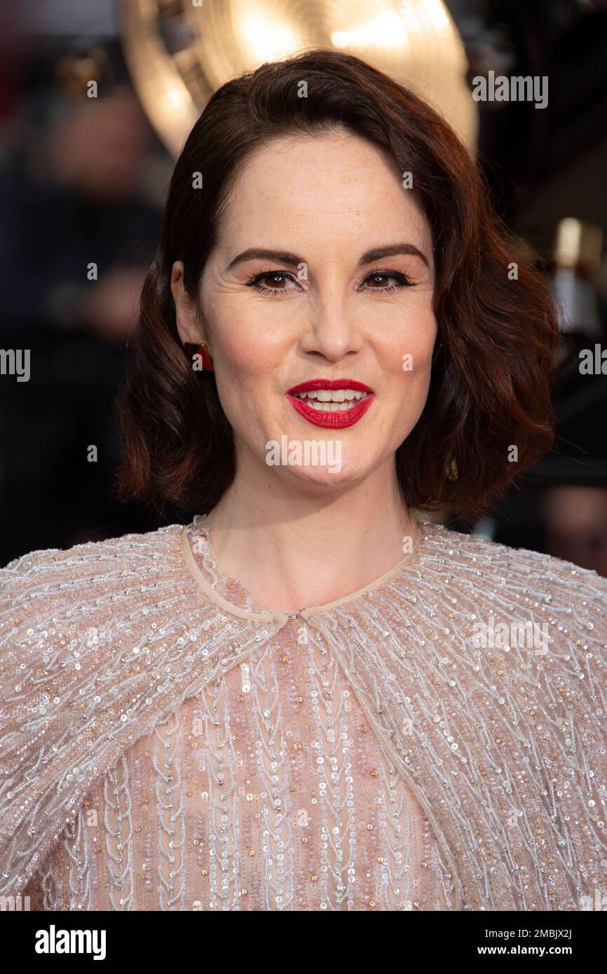 Michelle Dockery poses for photographers upon arrival at the World ...