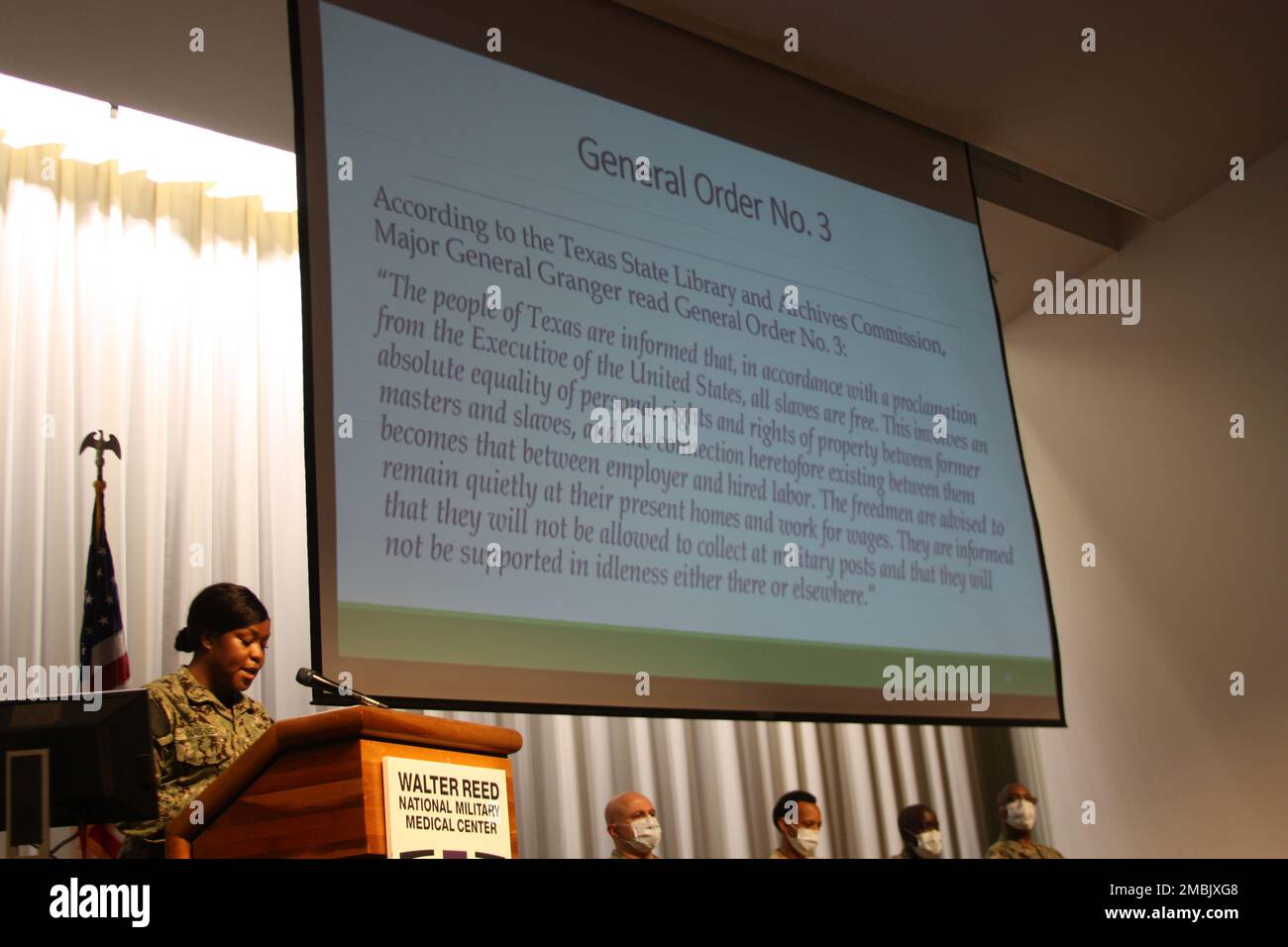 Hospital Corpsman 2nd Class JoAnn Olusoga reads General Order No. 3 ...
