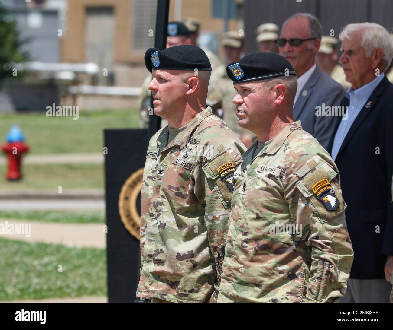 Colonel Ed Matthaidess III and Command Sergeant Major Charles D. Walker sing the Army Song ...
