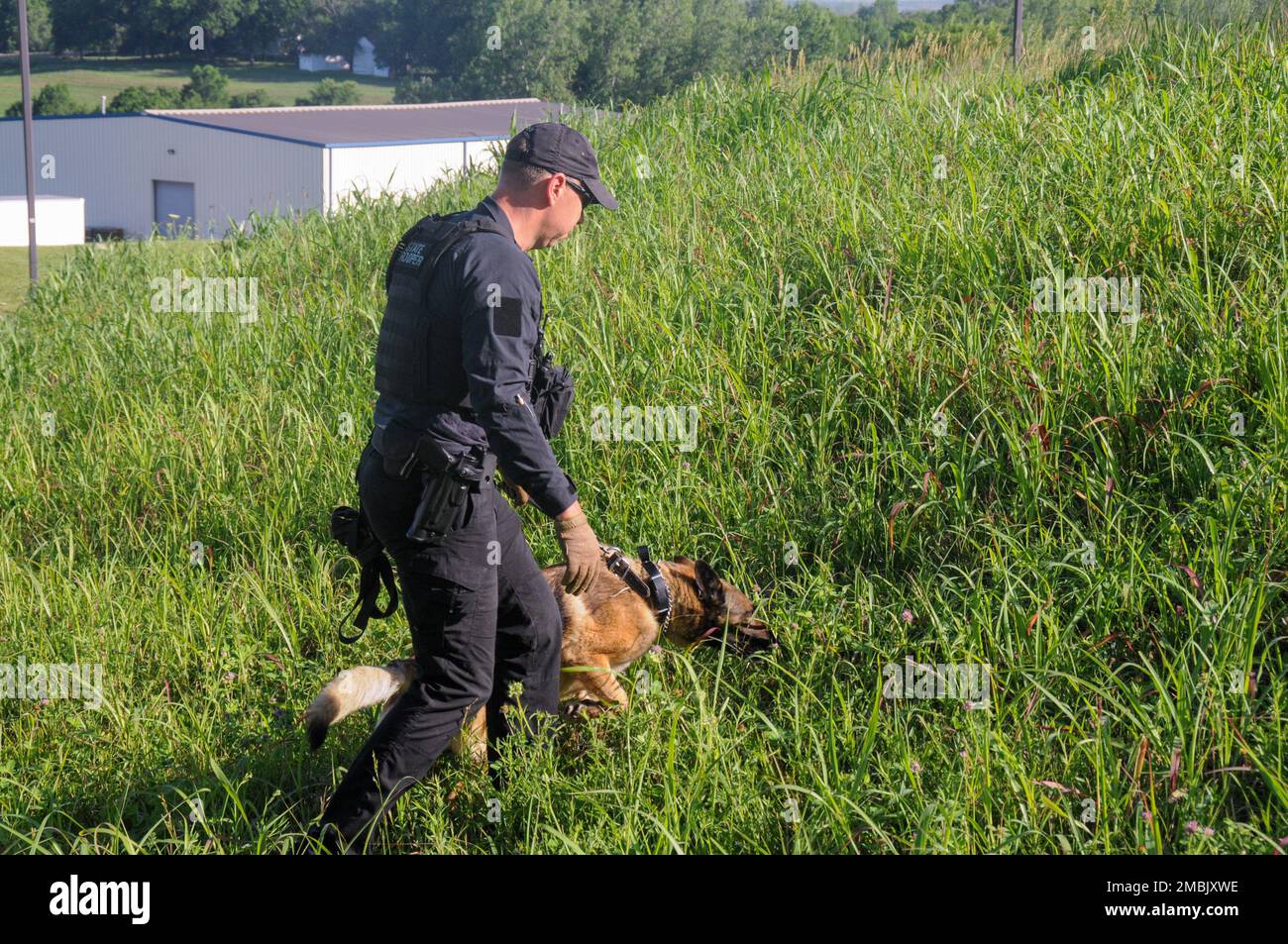 Technical Trooper Bryan Clark, with Kansas Highway Patrol, and his K-9 ...