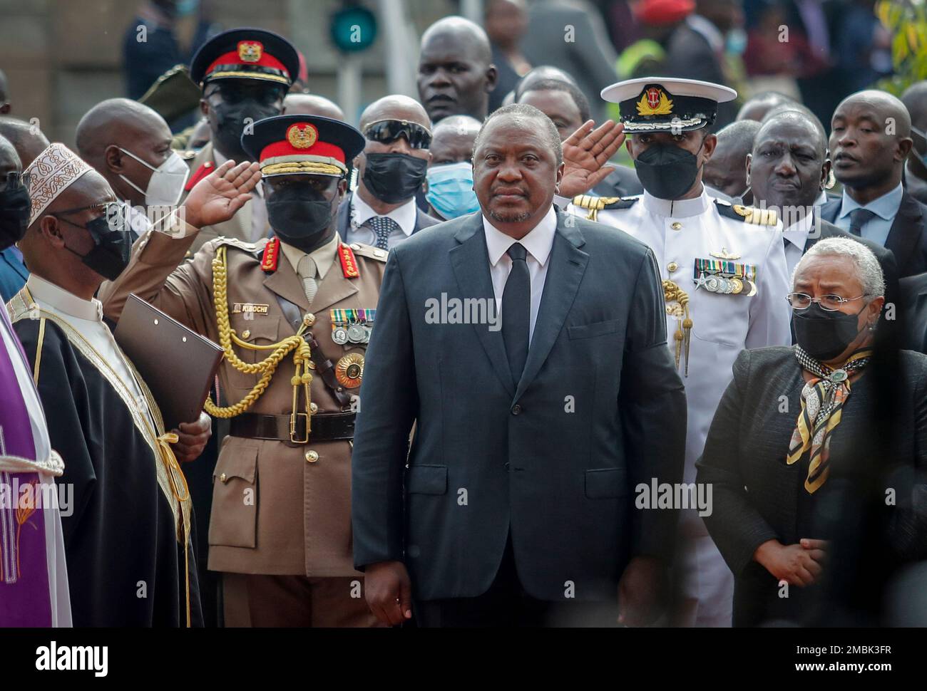 Kenya's President Uhuru Kenyatta, center, and his wife Margaret Kenyatta, right, arrive to view ...
