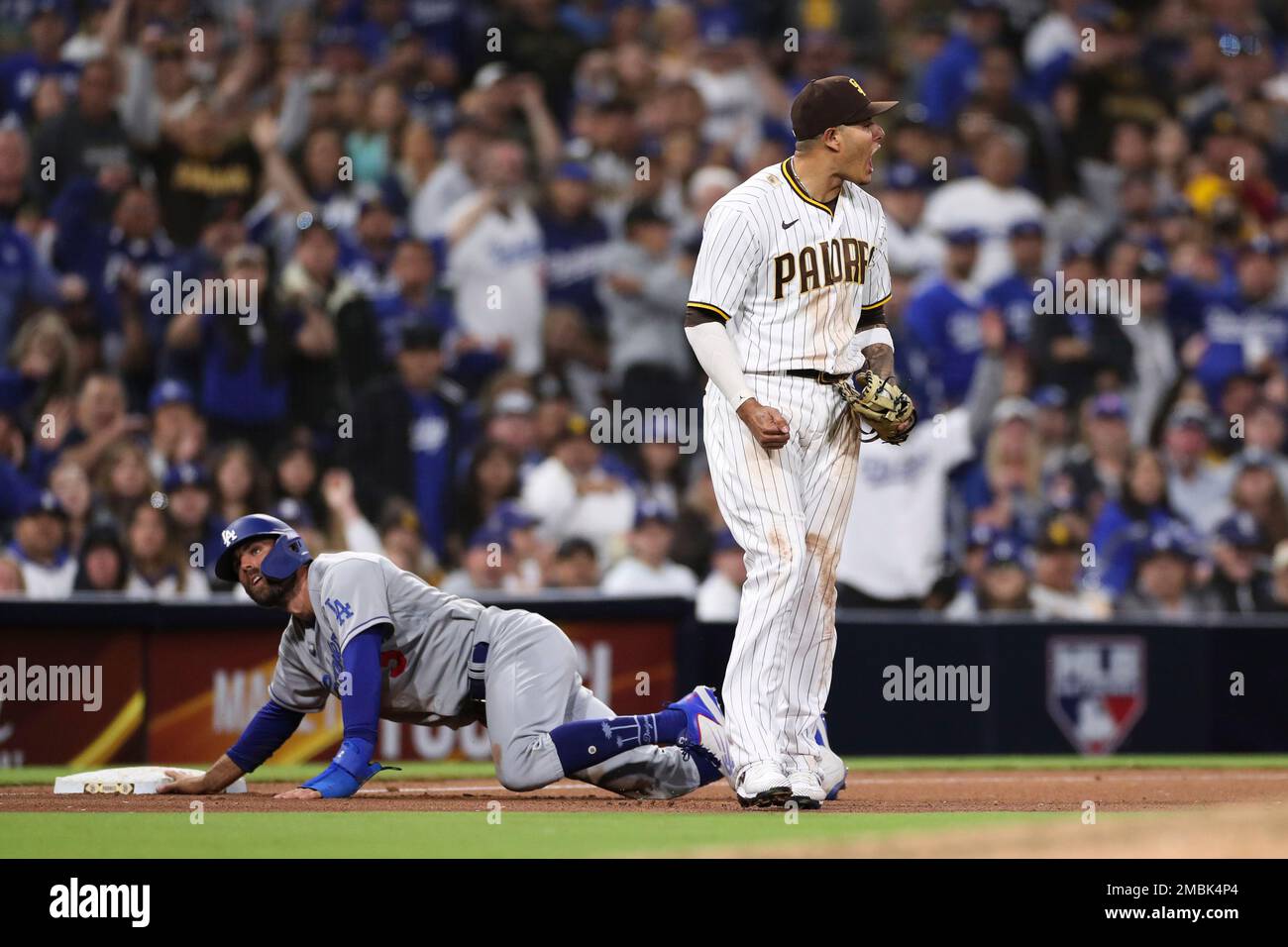 San Diego Padres third baseman Manny Machado, right, celebrates after ...