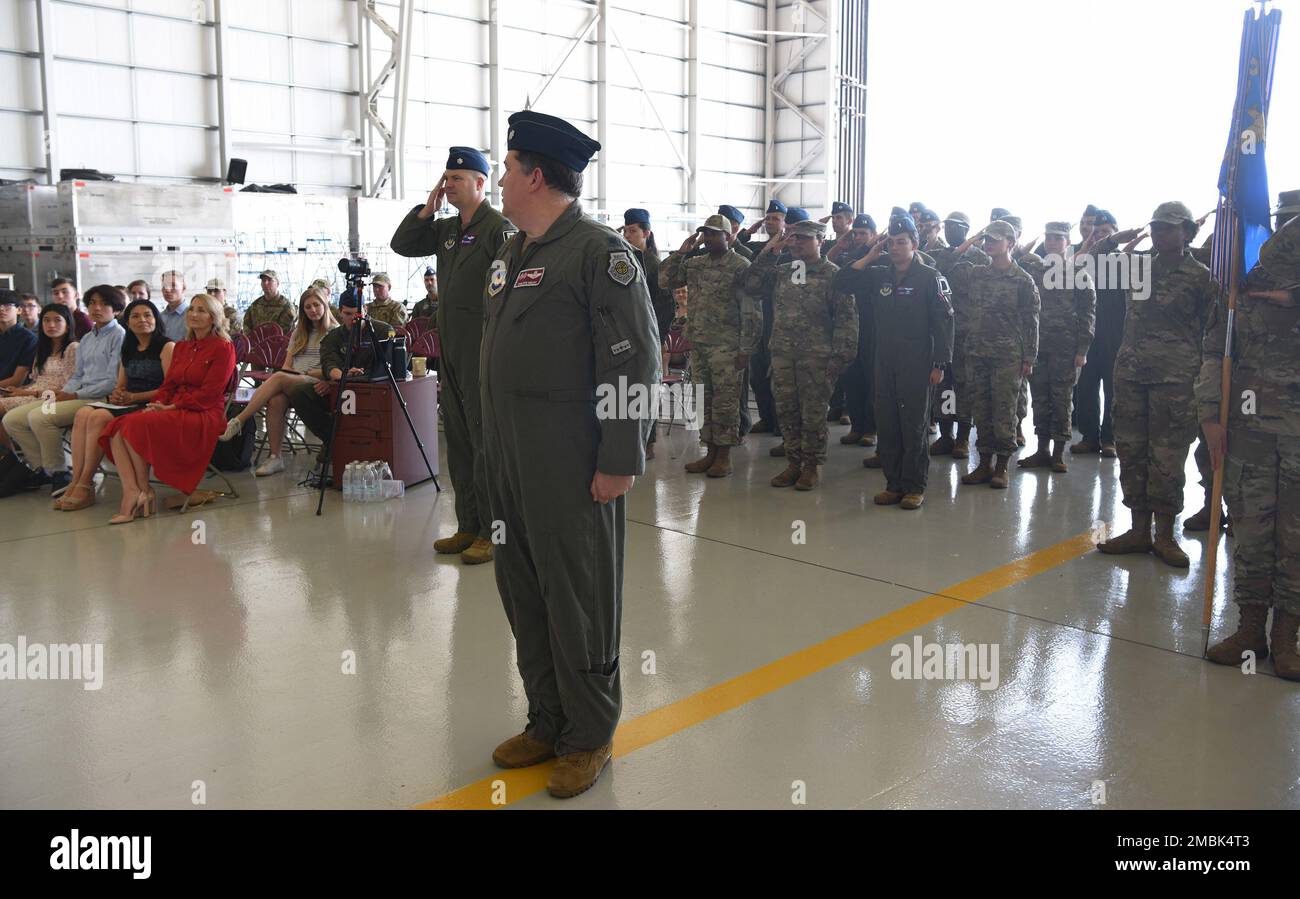 U.S. Air Force Airmen render a first salute to the new 100th Operations ...