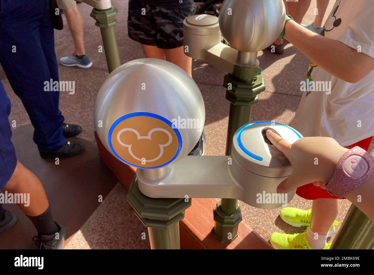 Disney employees collect fingerprints from visitors to verify ...