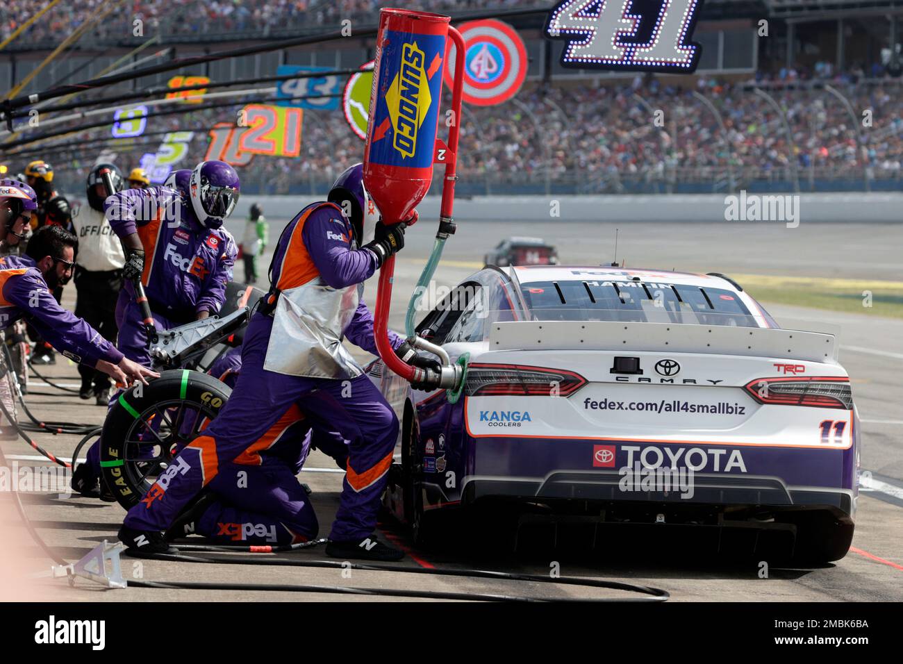 NASCAR Cup Series driver Denny Hamlin (11) gets gas and tires during the NASCAR Cup Series auto ...