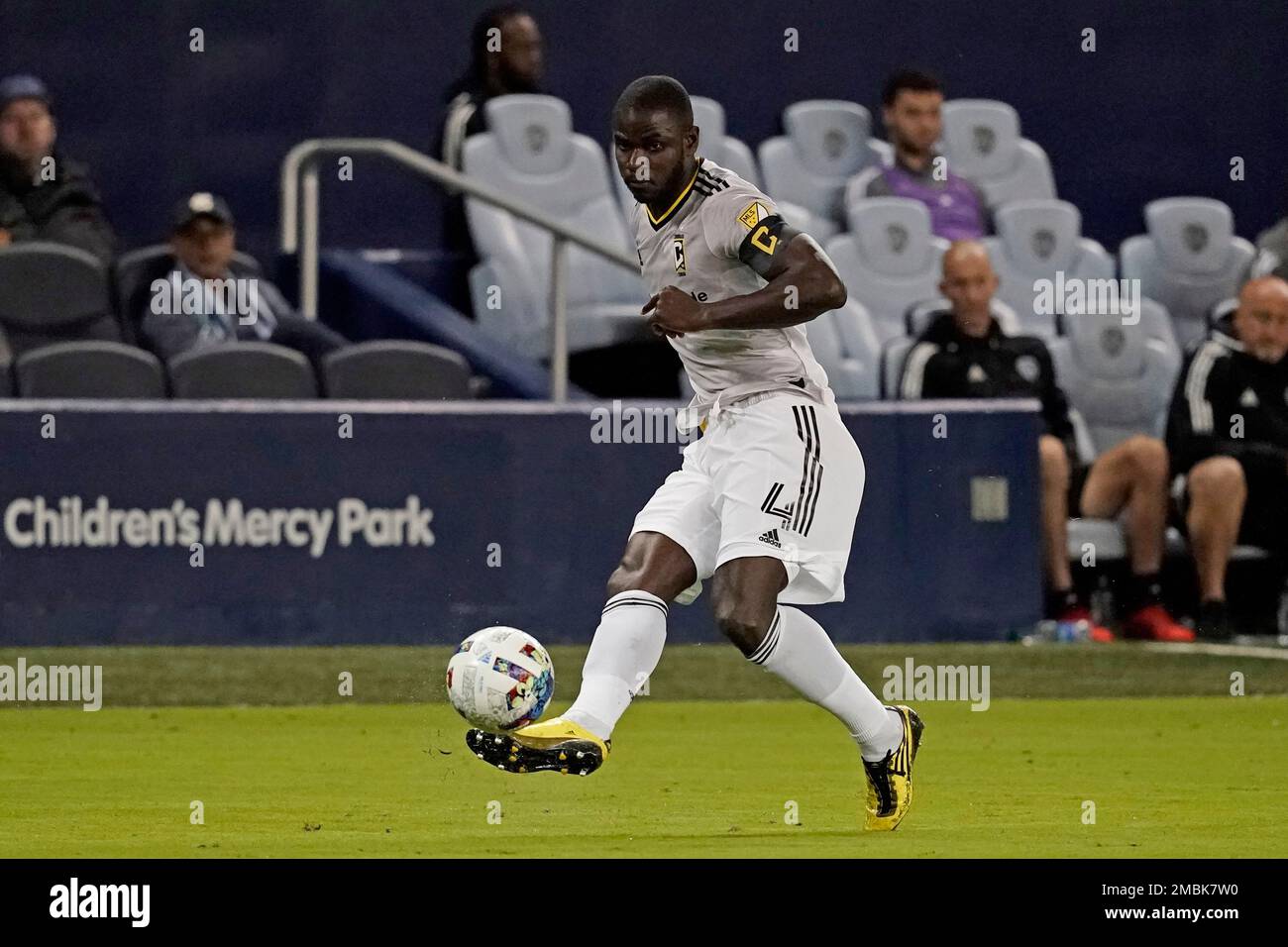 Columbus Crew defender Jonathan Mensah kicks the ball during the first ...