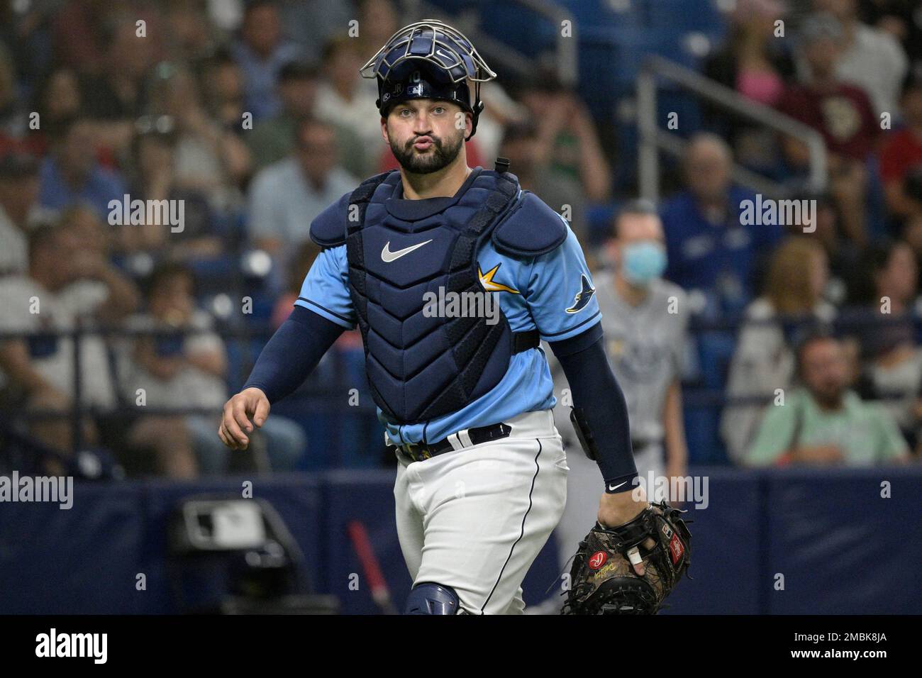 Tampa Bay Rays catcher Mike Zunino walks back to the dugout after ...