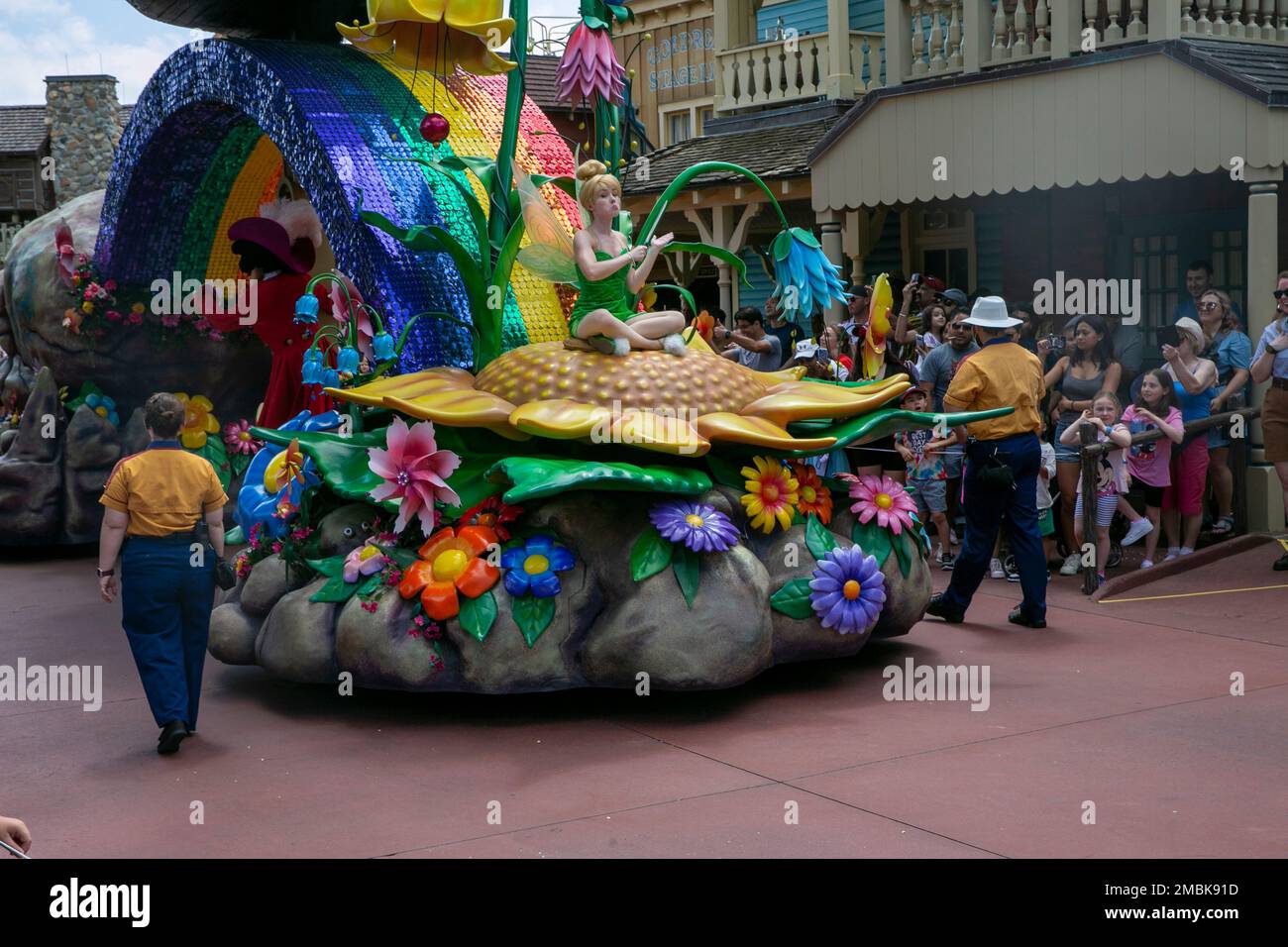 An actor portraying Tinker Bell performs on a float during the Festival ...