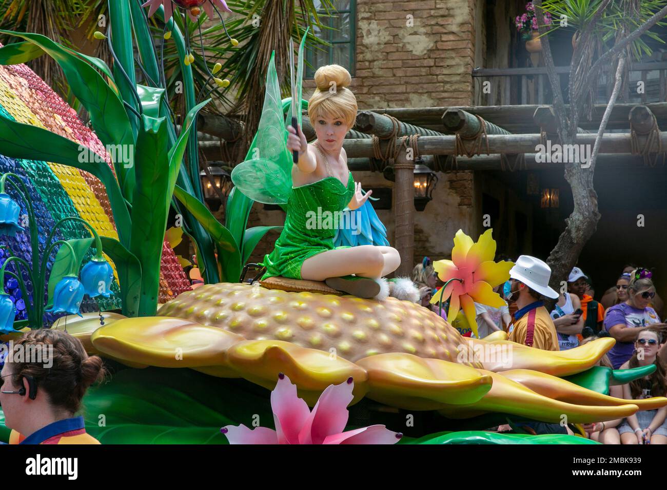 An actor portraying Tinker Bell performs on a float during the Festival ...