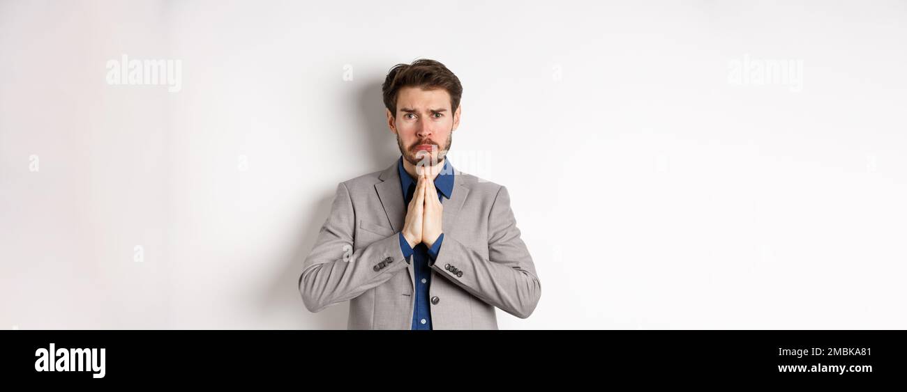 Miserable whining businessman asking for loan, need help and begging ...