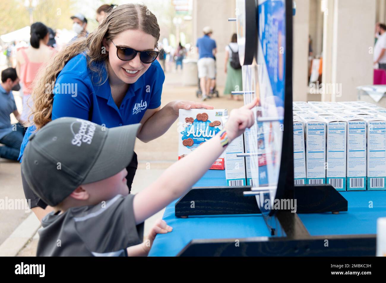 IMAGE DISTRIBUTED FOR AIRLY FOODS - A child spins the prize wheel at ...