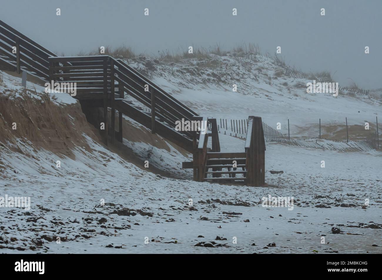 Snow covered stairs on an Atlantic Coast beach Stock Photo - Alamy