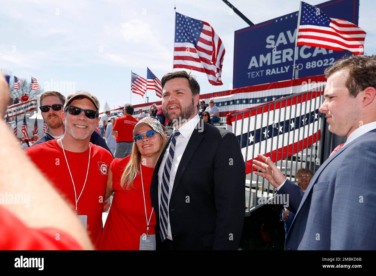 Rick and Erin Trott, from left, meet Republican senate candidate JD ...