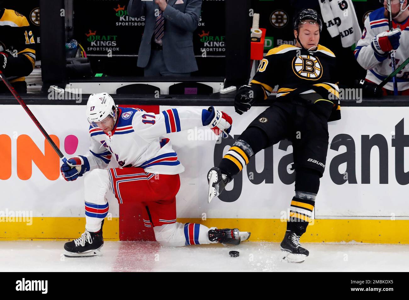 New York Rangers' Kevin Rooney (17) and Boston Bruins' Curtis Lazar (20 ...