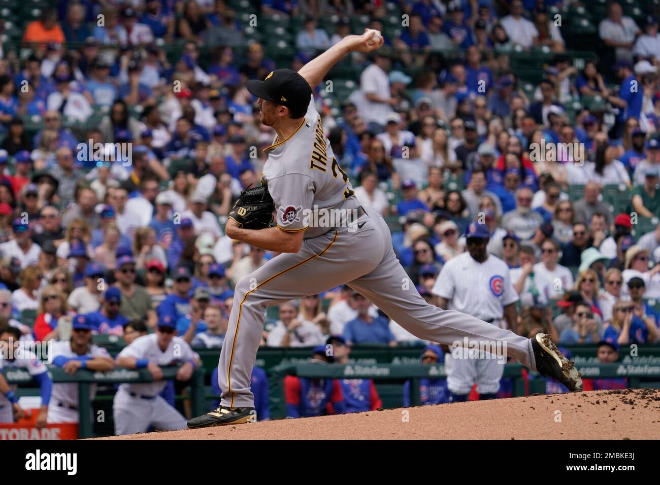 Pittsburgh Pirates starting pitcher Zach Thompson throws against the ...