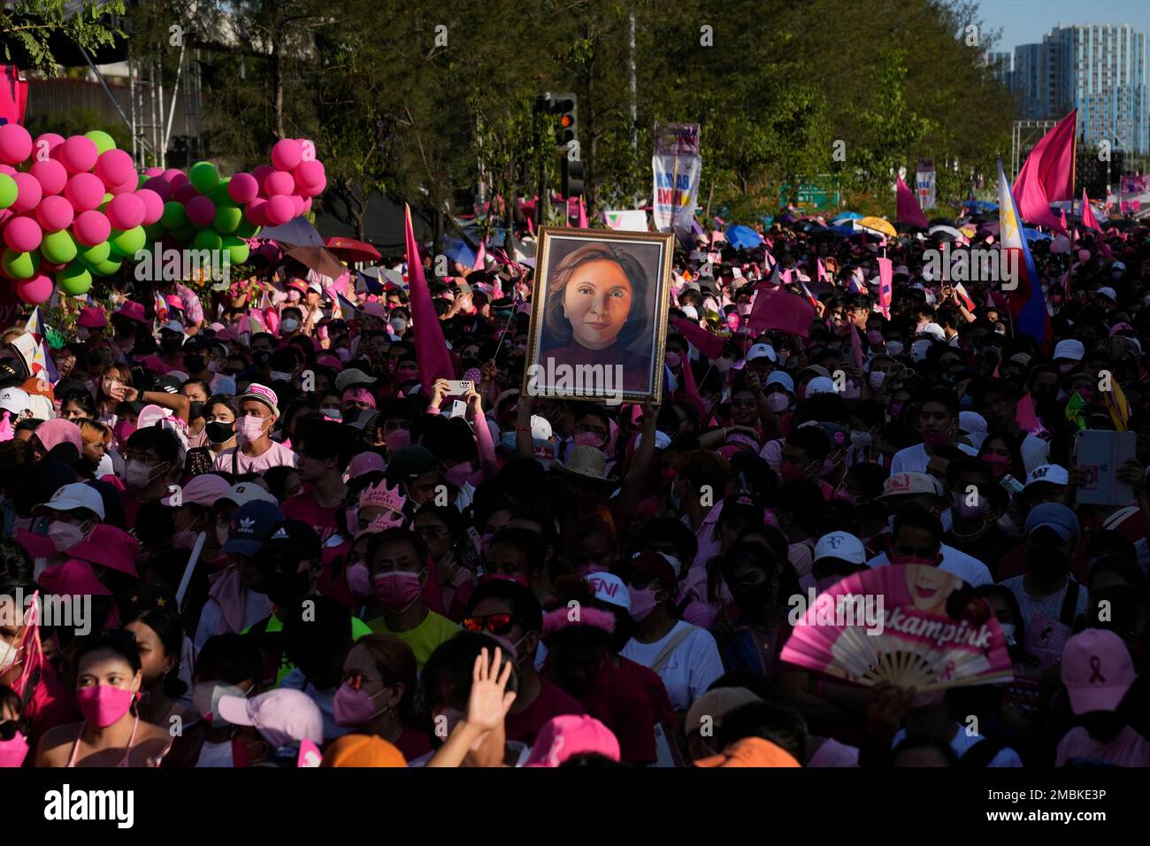 A painting of Vice-President Leni Robredo is carried in the middle of a ...