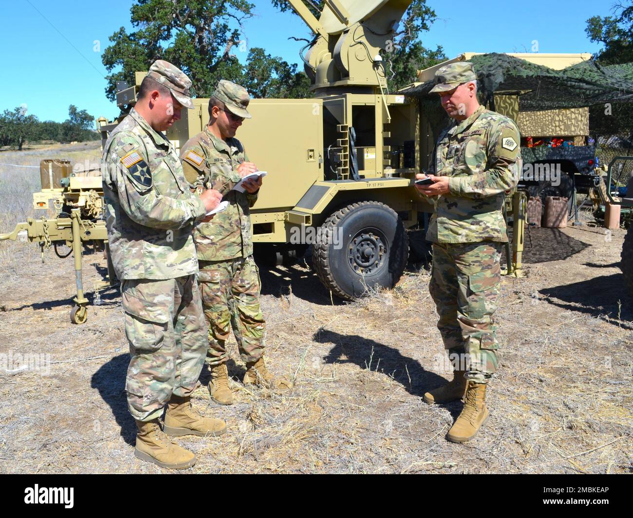 Signal Soldiers, Spc. Jesse Simpson and Pfc. Brandon Ingram receive ...