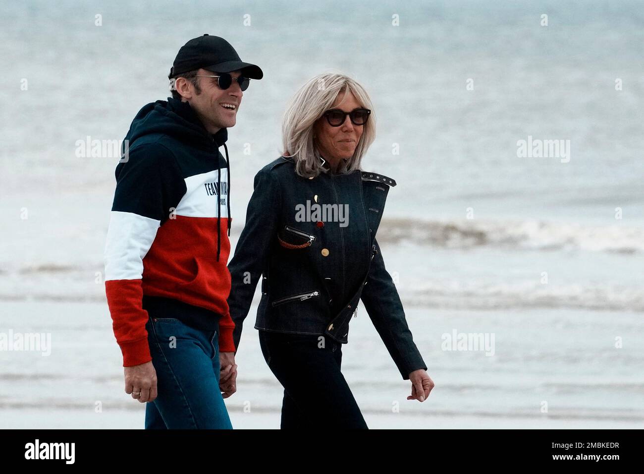 Centrist candidate and French President Emmanuel Macron, left, and his ...