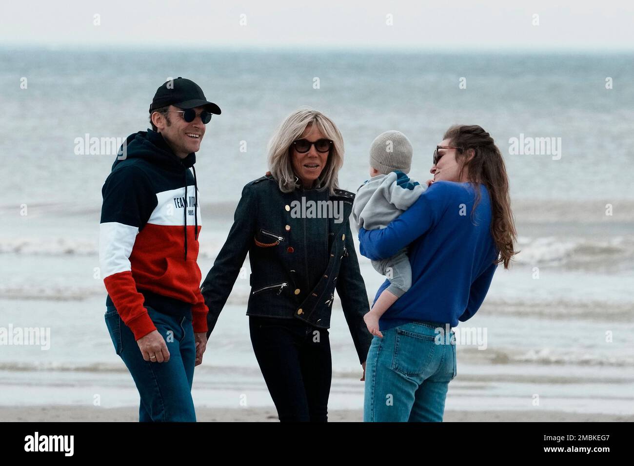 Centrist candidate and French President Emmanuel Macron, left, and his ...