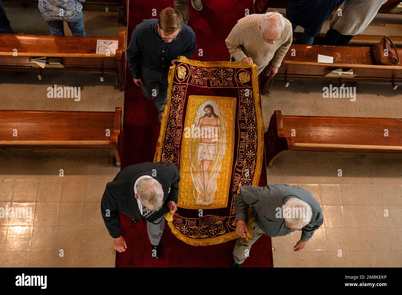 Members of the congregation preform the procession of the Holy Shroud ...
