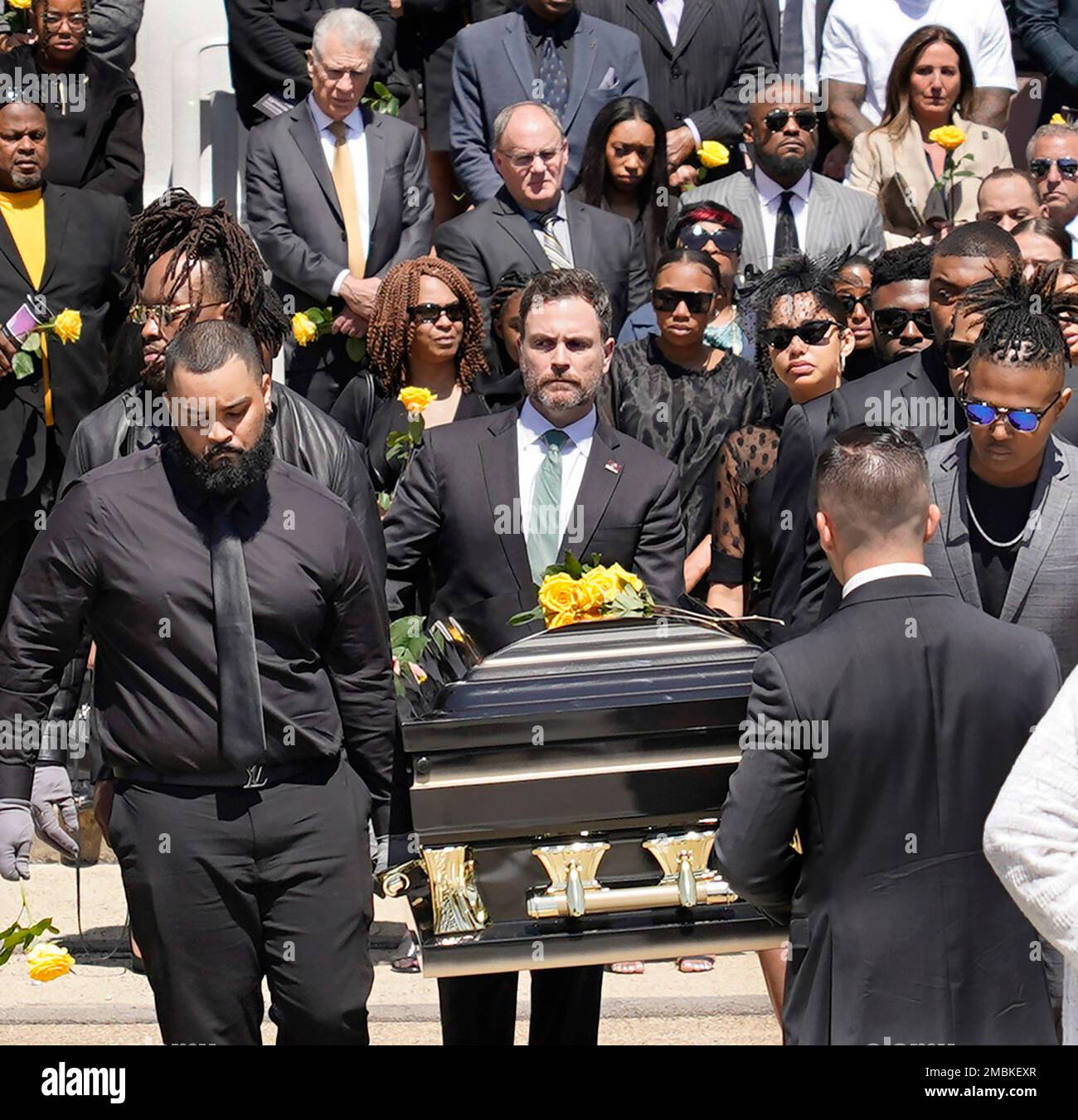 Pallbearers carry the casket of Pittsburgh Steelers' Dwayne Haskins, to ...