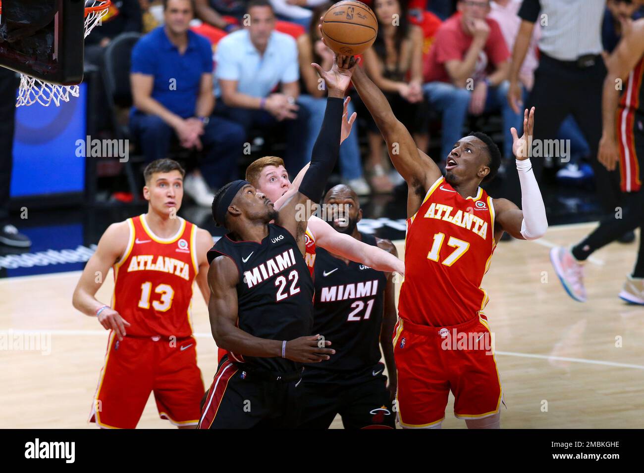 Miami Heat forward Jimmy Butler (22) reaches for a rebound against ...
