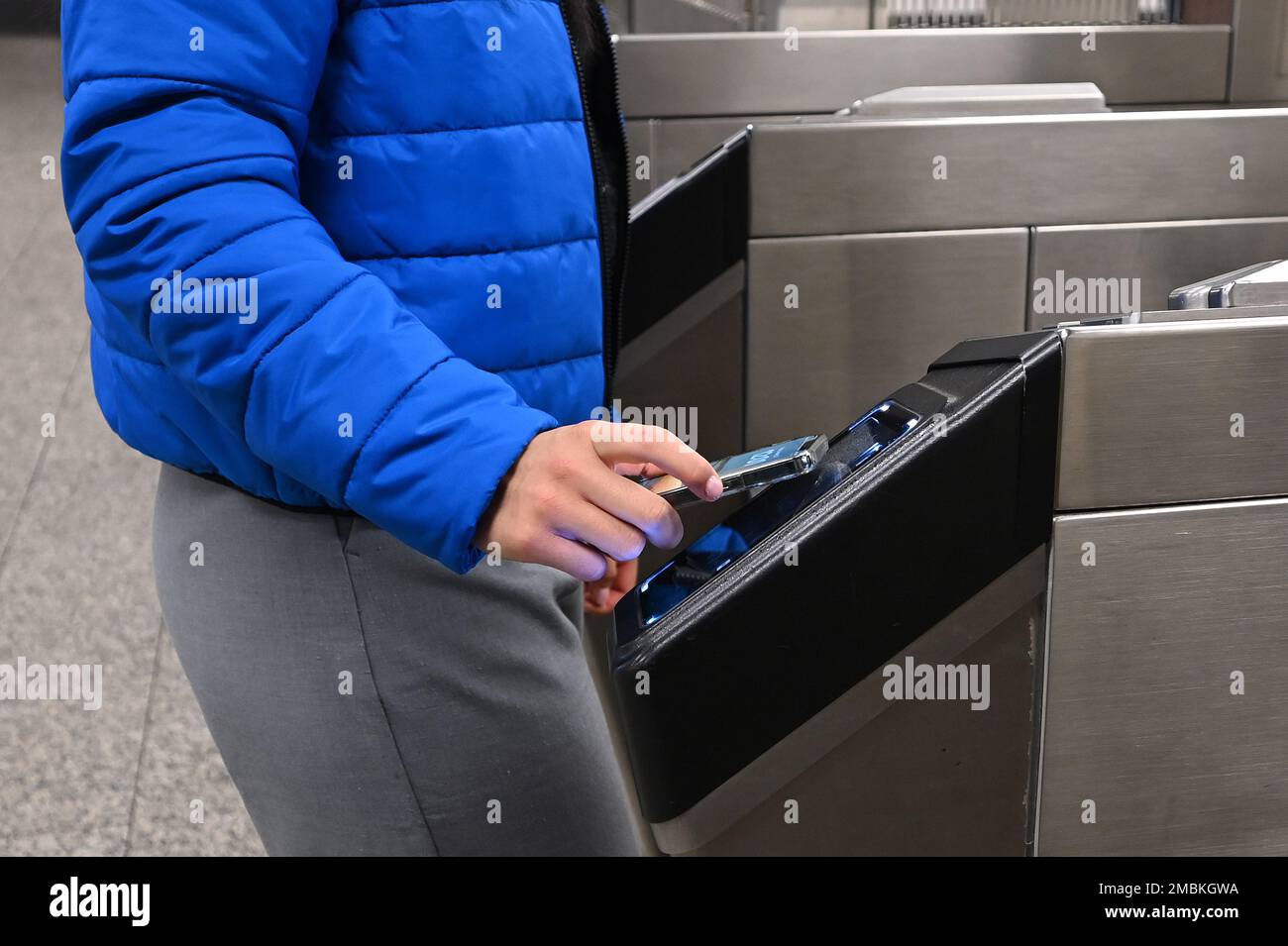 New York, USA. 20th Jan, 2023. A commuter is seen using the OMNY ...