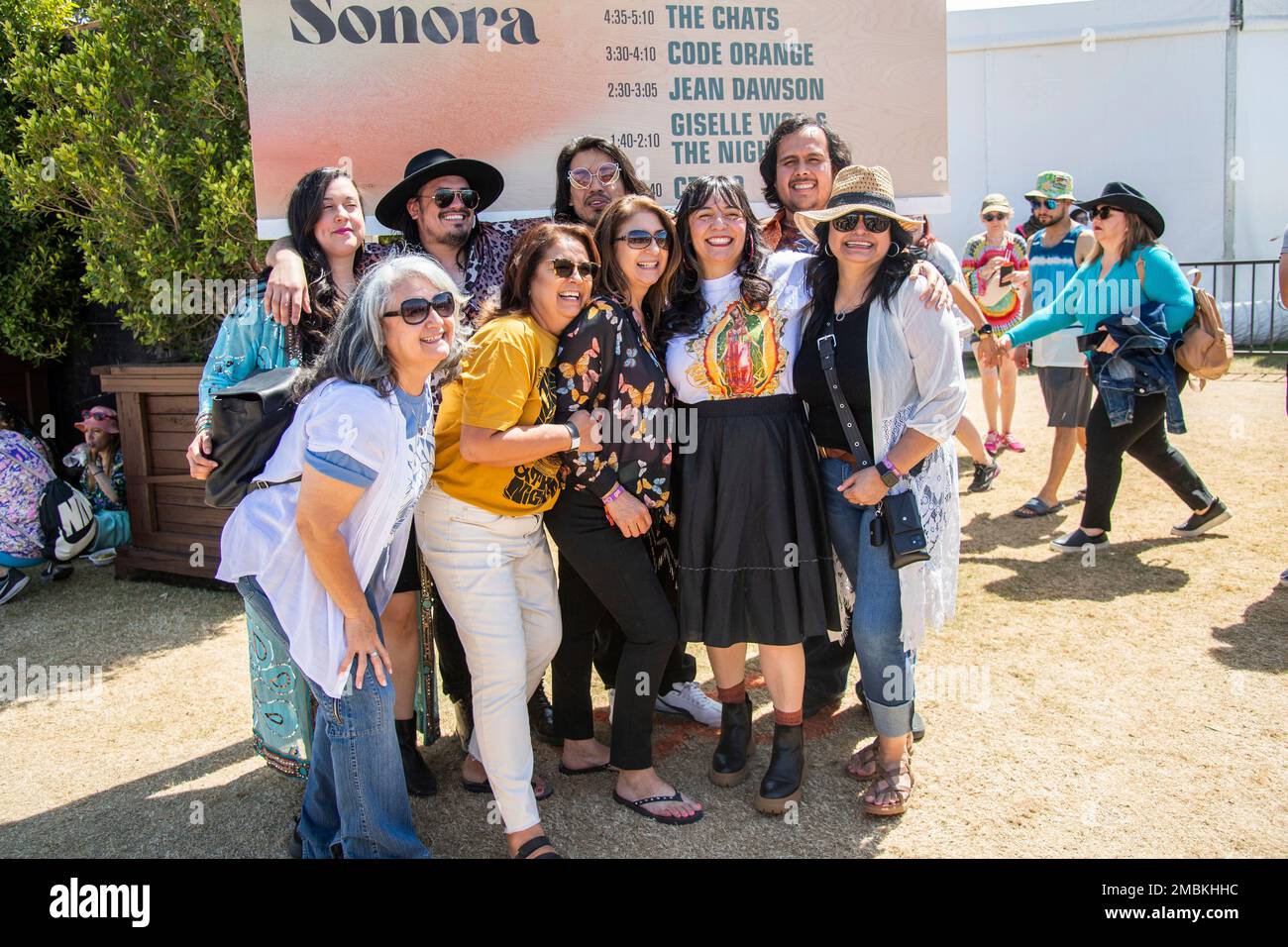 Giselle Woo, center, poses with festivalgoers at the Coachella Music ...
