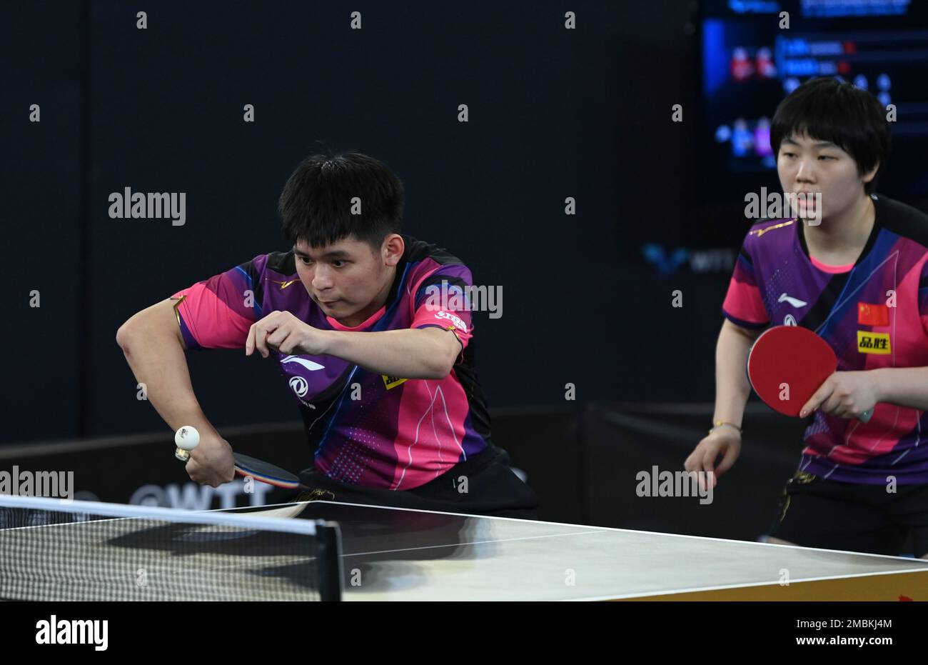 Doha, Qatar. 20th Jan, 2023. Kuai Man/Lin Shidong (L) compete during ...
