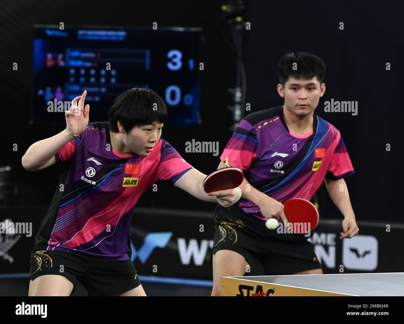 Doha, Qatar. 20th Jan, 2023. Kuai Man(L)/Lin Shidong compete during the ...