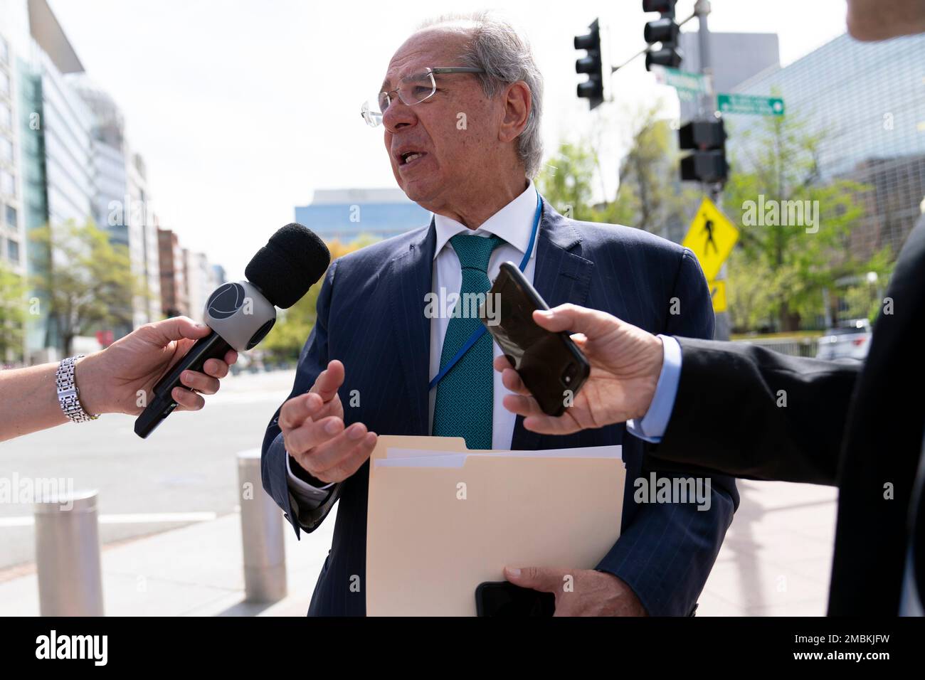Brazil's Economy Minister Paulo Guedes talks to reporters outside of ...