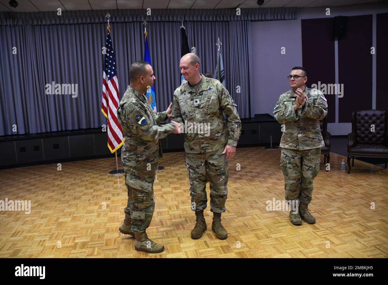 Col. Miguel Cruz, Space Delta 4 commander (left), congratulates Lt. Col ...