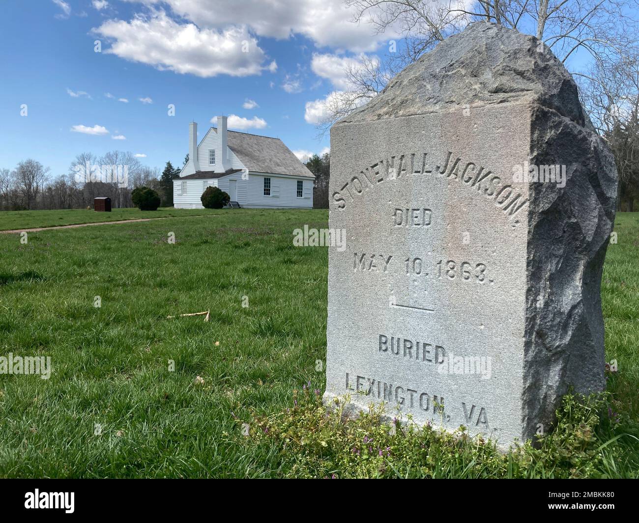 In this April 3, 2022, photo, a granite marker stands near the small ...