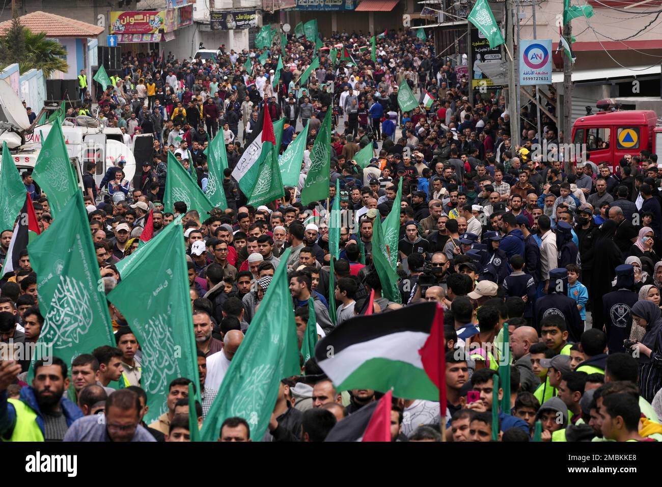 Hamas supporters wave green Islamic flags during a rally in solidarity ...