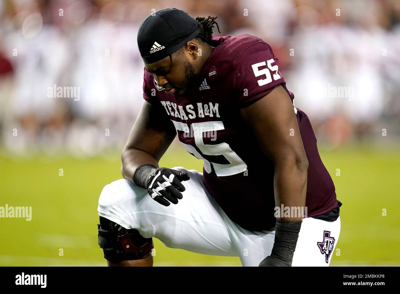 FILE - Texas A&M offensive lineman Kenyon Green (55) takes a moment ...