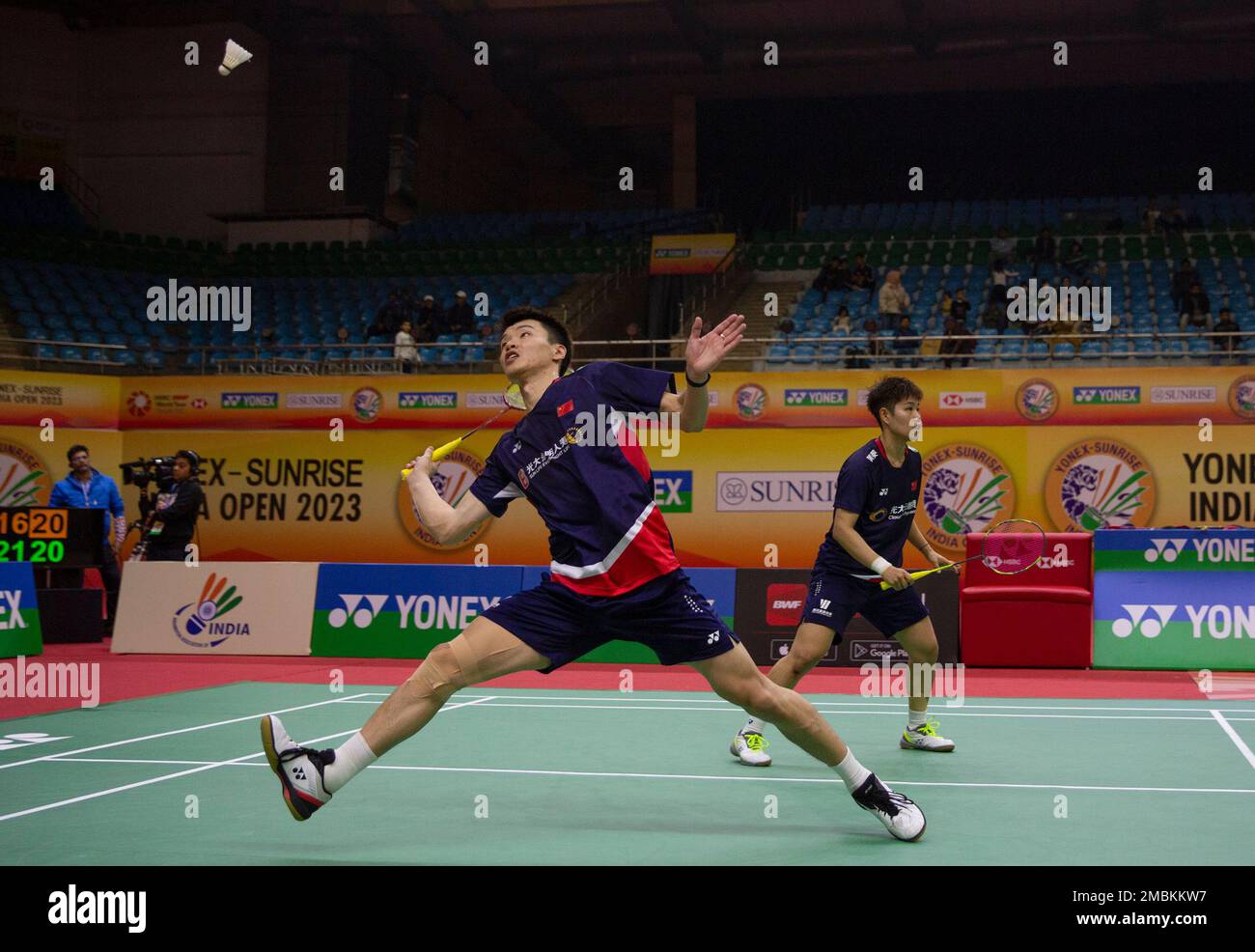 New Delhi, India. 20th Jan, 2023. Wang Yilyu(L)/Huang Dongping compete ...