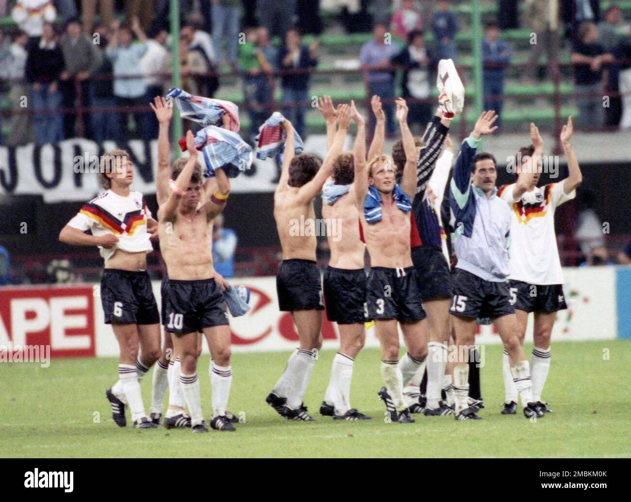 West German soccer players celebrate their 4-1 victory over Yugoslavia ...
