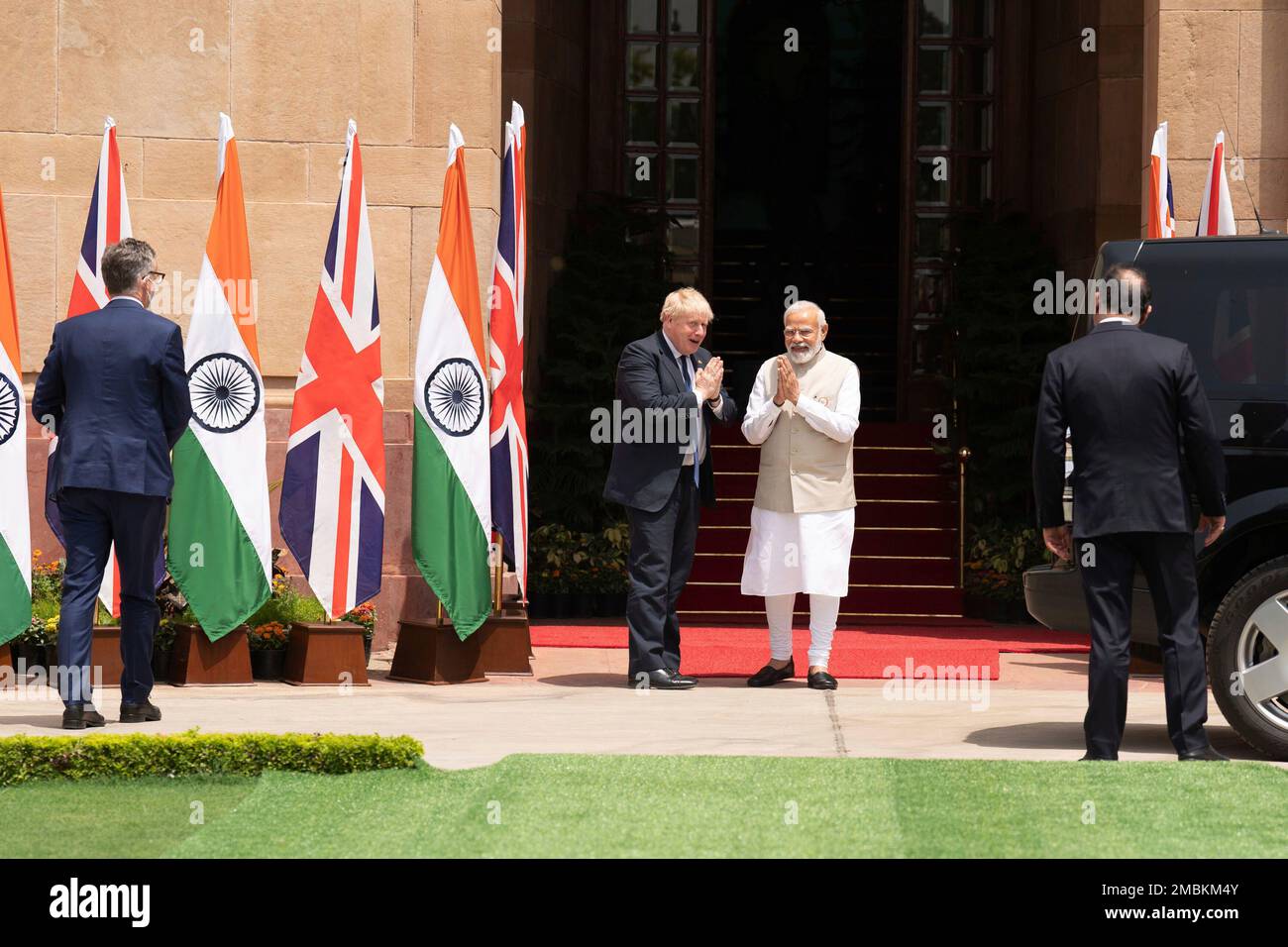 British Prime Minister Boris Johnson, left, meets Indian Prime Minister ...