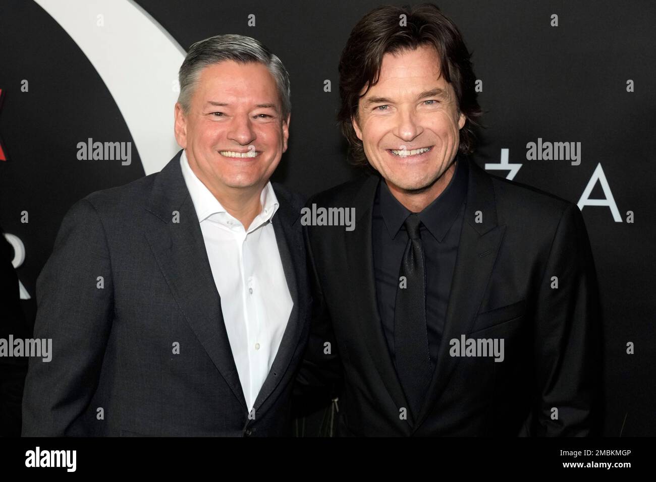 Ted Sarandos, left, and Jason Bateman attend the world premiere of the ...