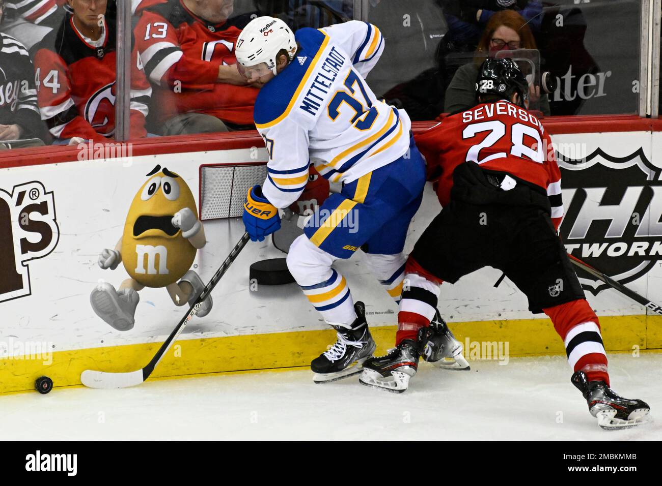 Buffalo Sabres center Casey Mittelstadt (37) slips away from New Jersey ...