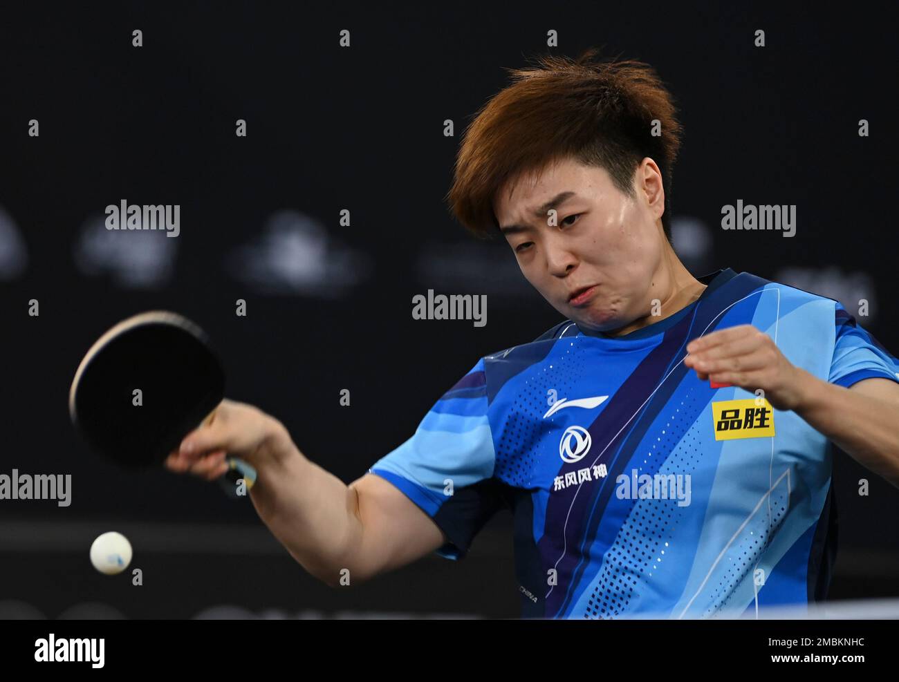 Doha, Qatar. 20th Jan, 2023. Zhang Rui hits a return during the women's ...