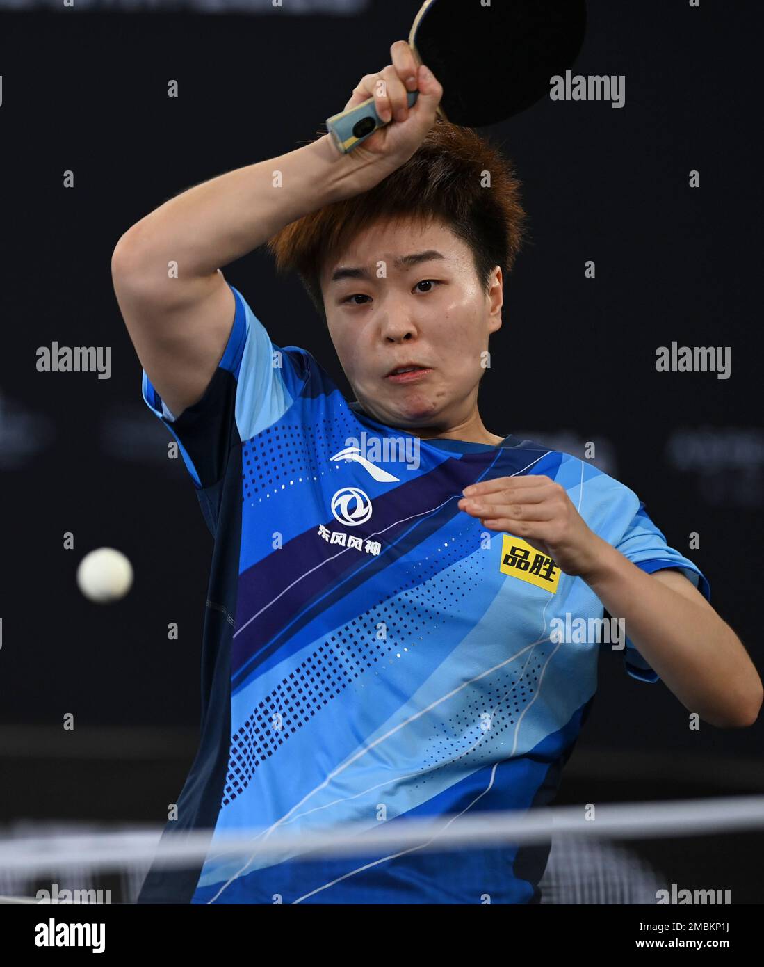Doha, Qatar. 20th Jan, 2023. Zhang Rui hits a return during the women's ...