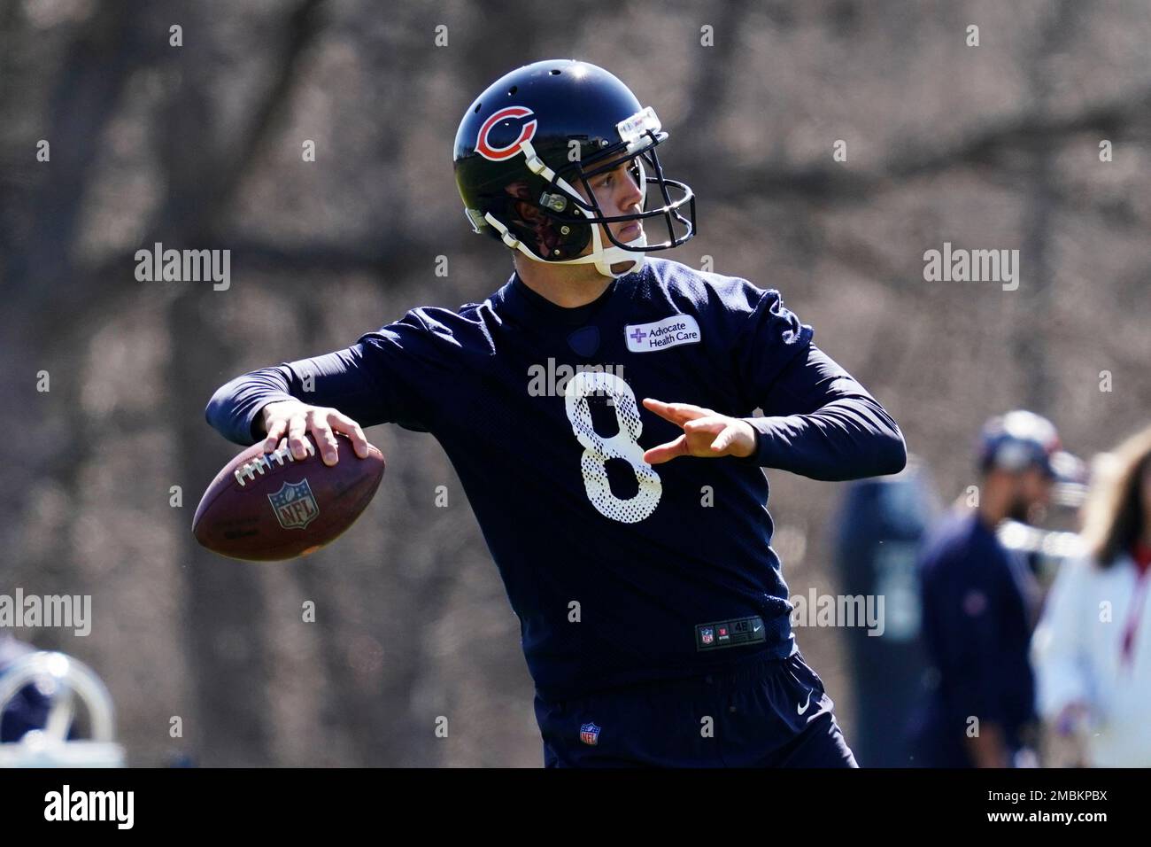 Chicago Bears punter Ryan Winslow looks to pass during the NFL football ...