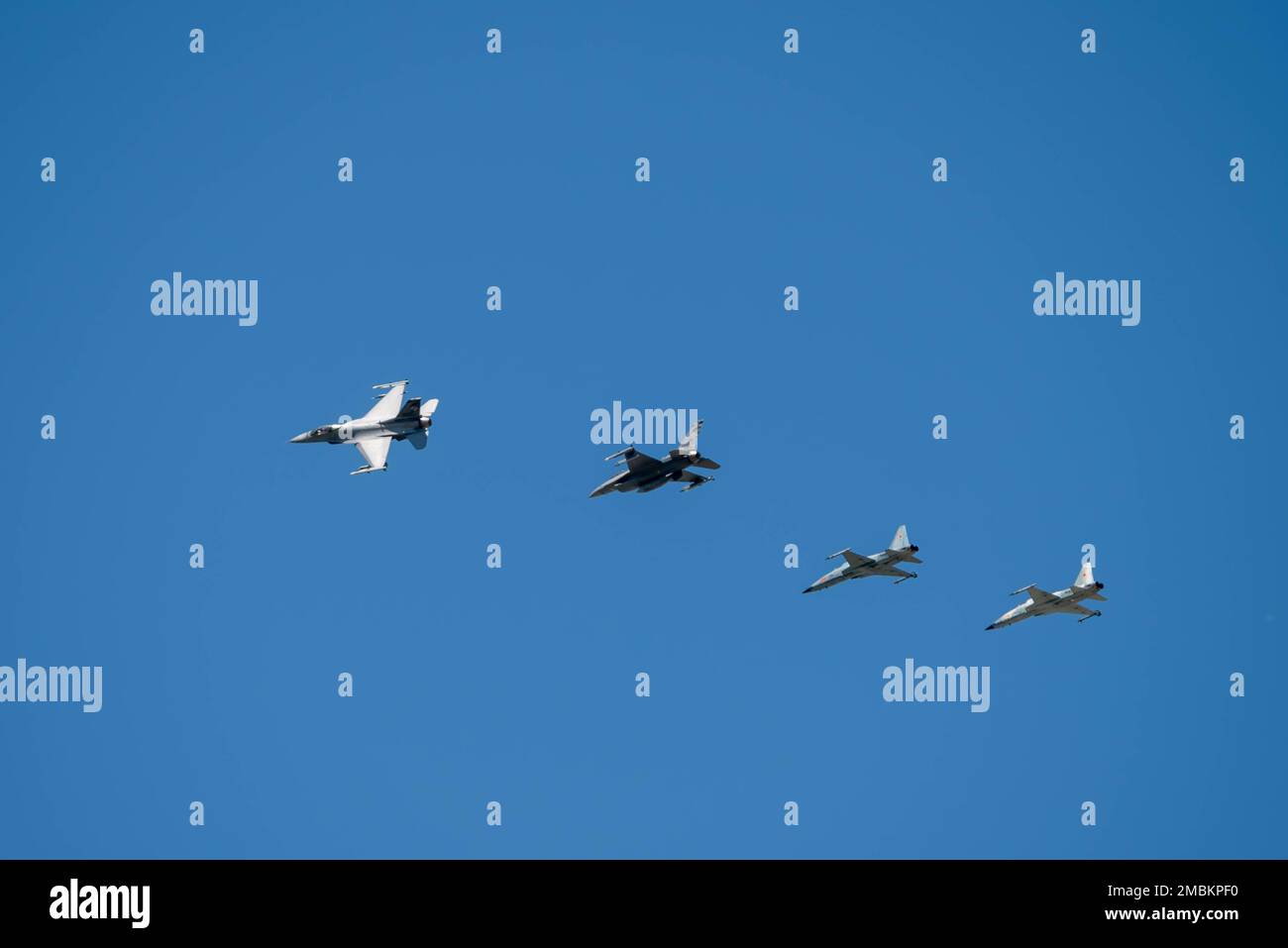 Two F-16s assigned to the 114th Fighter Wing and two F-5s assigned to ...